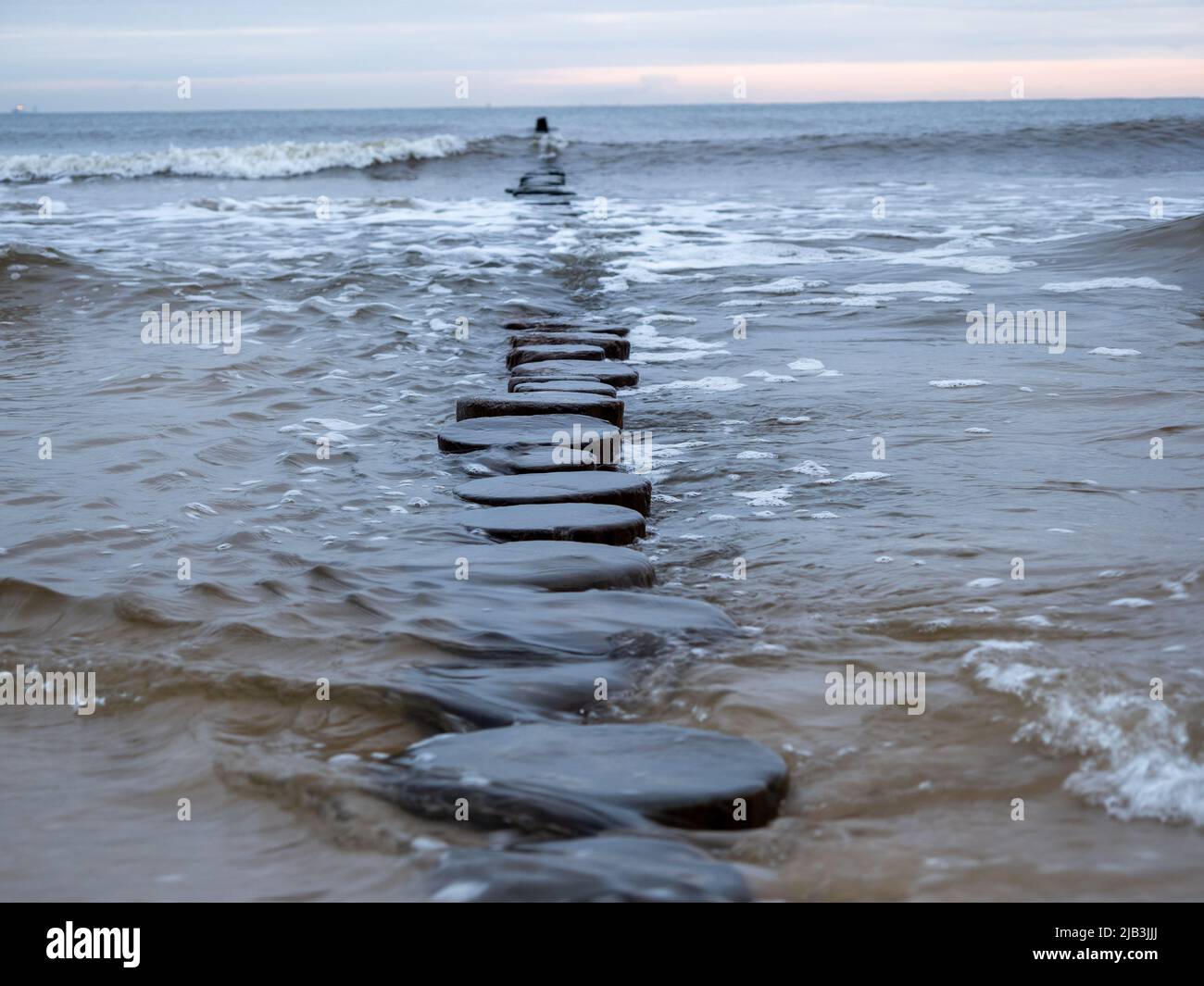 Row wooden breakwaters on hi-res stock photography and images - Alamy