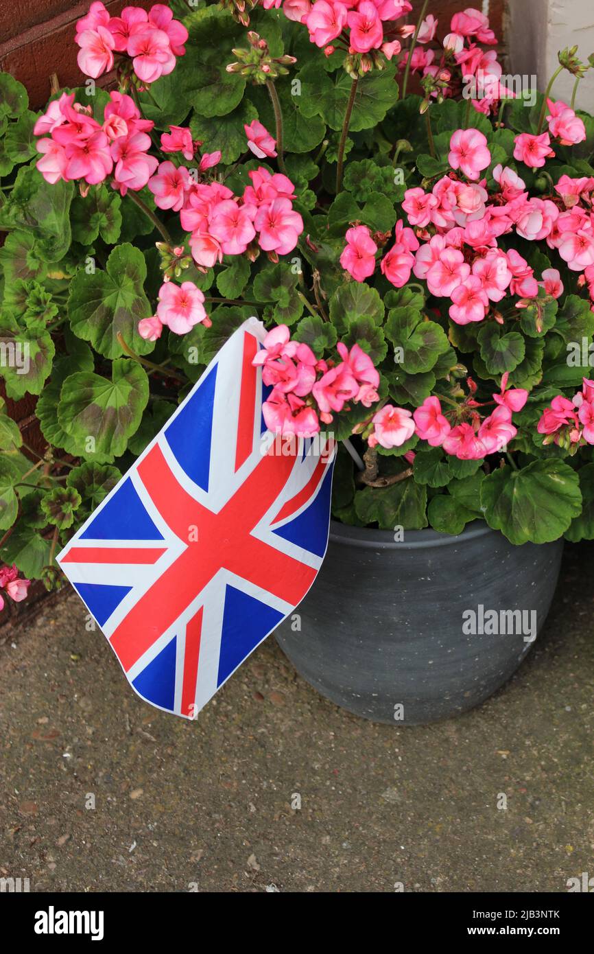 Union jack in a flower pot for jubilee weekend (Sidmouth, Devon, UK ...