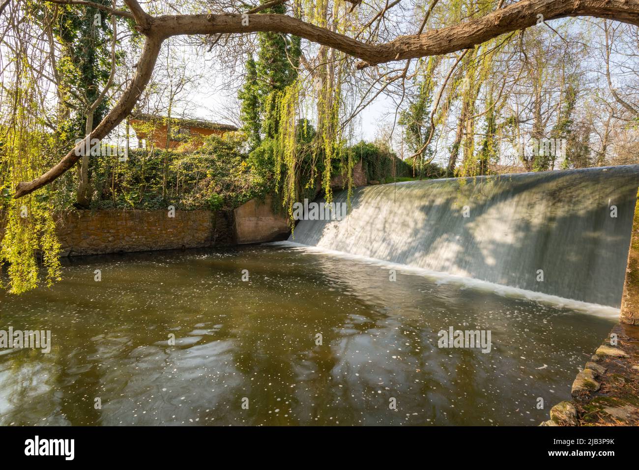 Long expsoure of the the big waterfall on the River Sid flowing into Sidmouth in Devon Stock ...