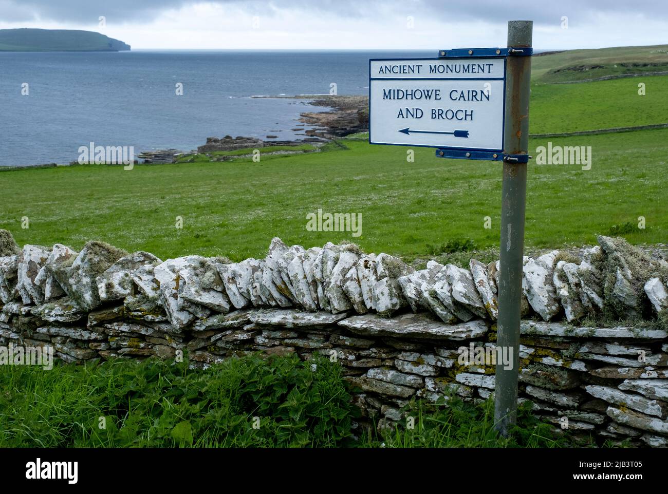 Sign pointing the way to Midhowe Broch Iron Age settlement, island of ...