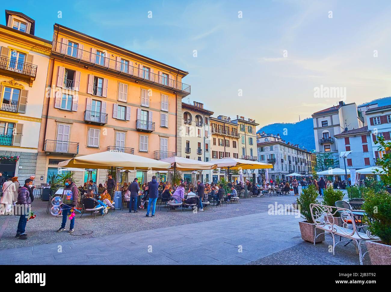 COMO, ITALY - MARCH 20, 2022: The evening on Alessandro Volta Square ...