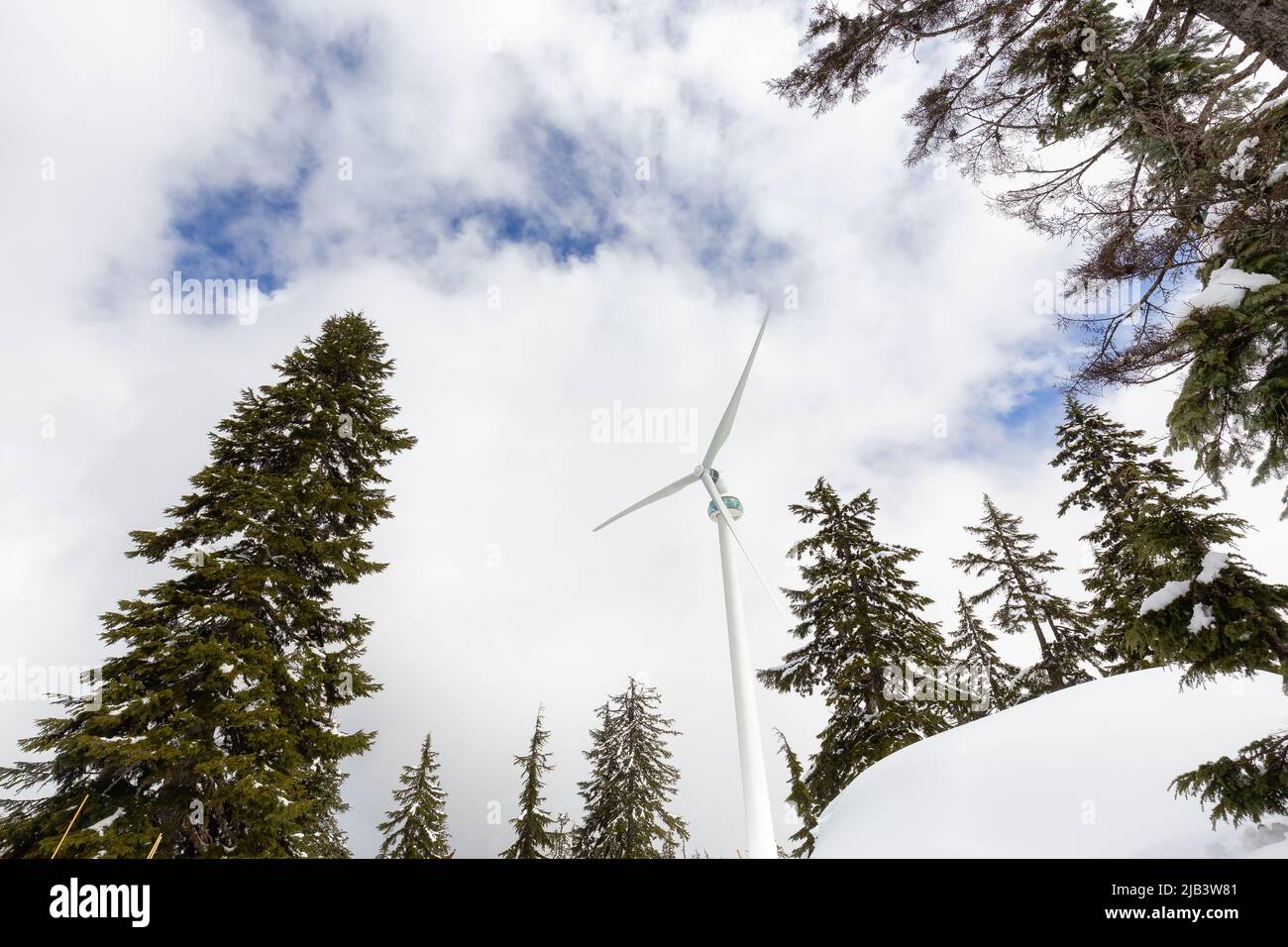 Wind Turbine on top of Grouse Mountain during cloudy winter season ...