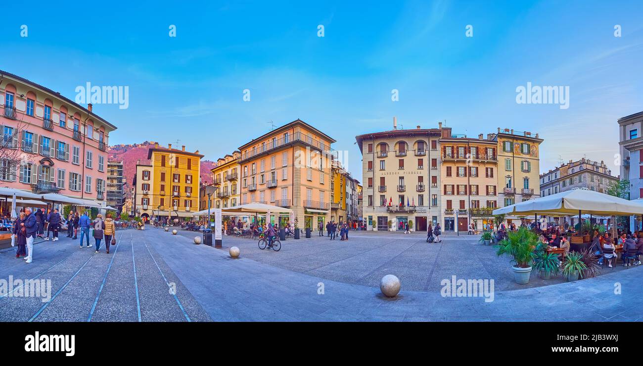 COMO, ITALY - MARCH 20, 2022: Enjoy the evening walk on Alessandro ...
