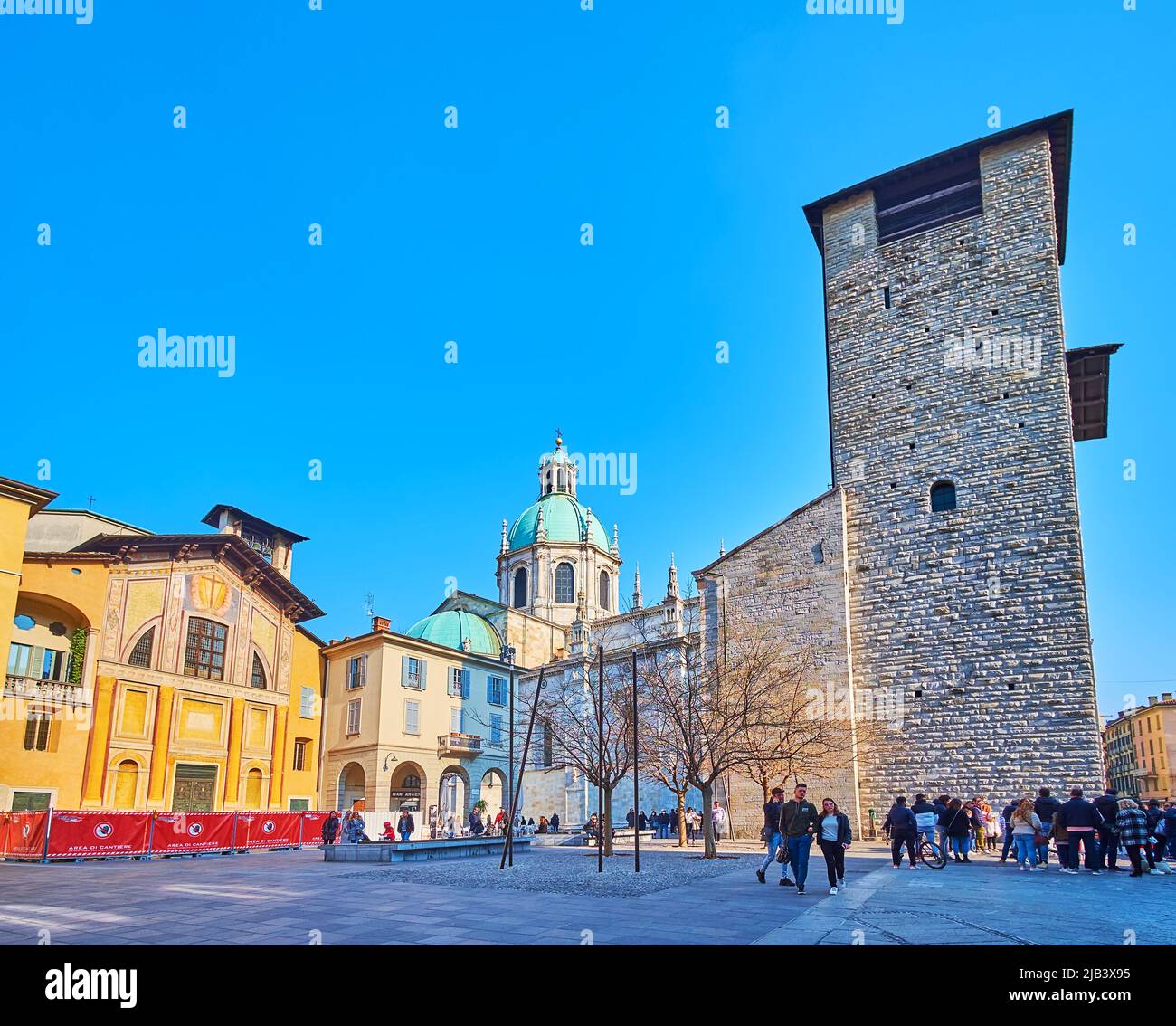 COMO, ITALY - MARCH 20, 2022: The stone tower of medieval building of ...