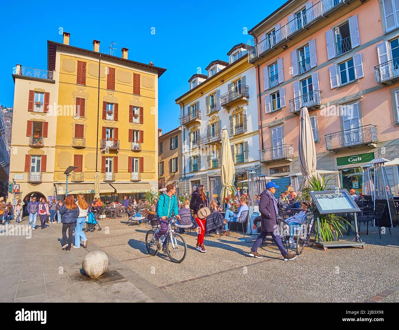 COMO, ITALY - MARCH 20, 2022: Colorful historic buildings on Alessandro ...