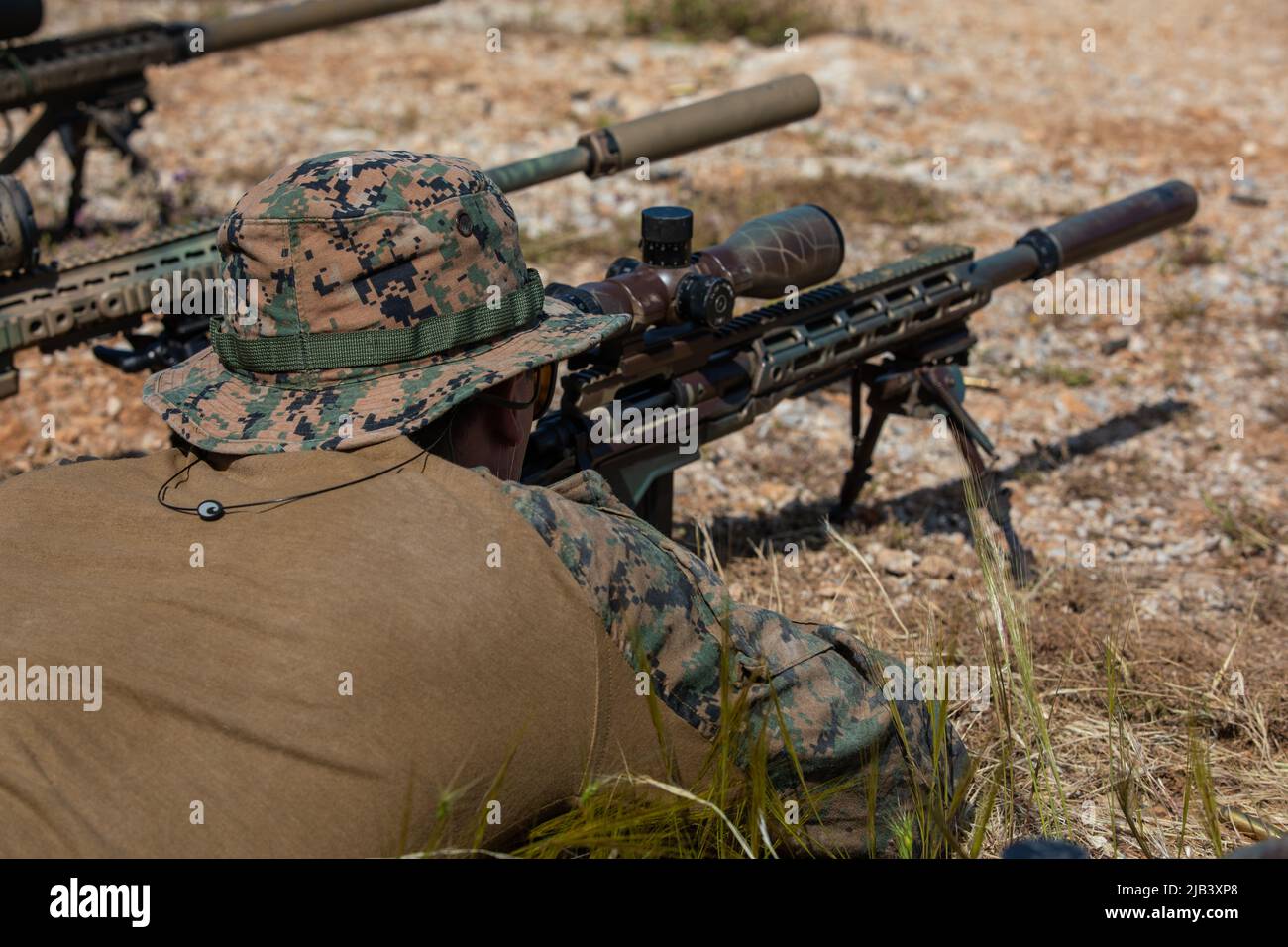 U.S. Marine Corps Sgt. Jordan Belyea, a scout sniper assigned to Echo ...