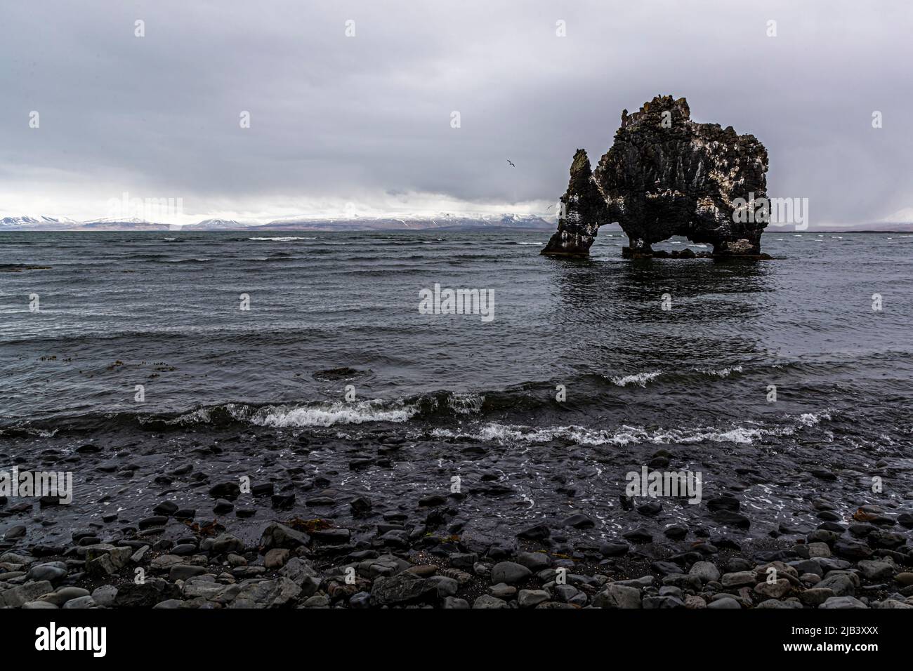 Rock jutting out of the sea hi-res stock photography and images - Alamy