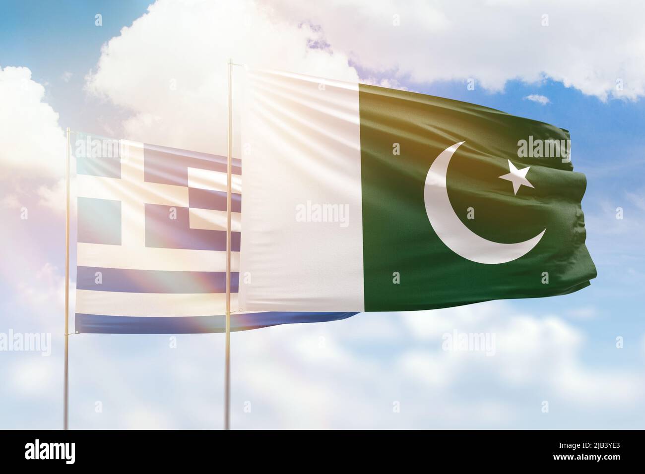 Sunny blue sky and flags of pakistan and greece Stock Photo - Alamy