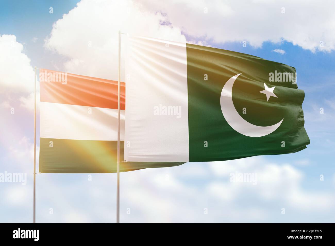 Sunny blue sky and flags of pakistan and hungary Stock Photo - Alamy