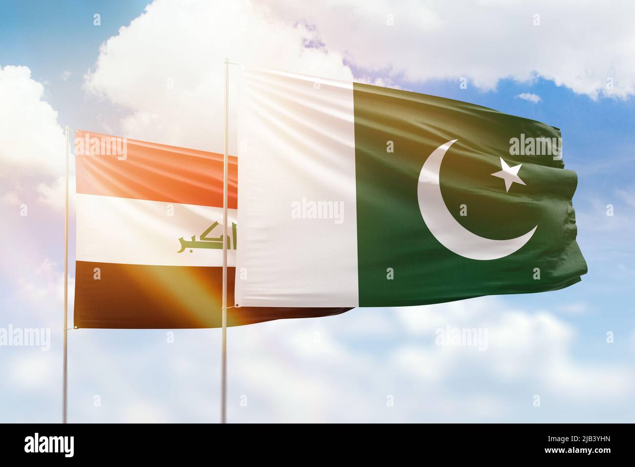 Sunny blue sky and flags of pakistan and iraq Stock Photo - Alamy