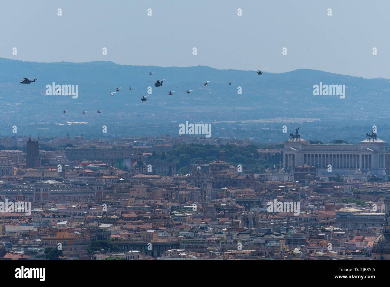 Italian army helicopters fly over the center of Rome during the ...