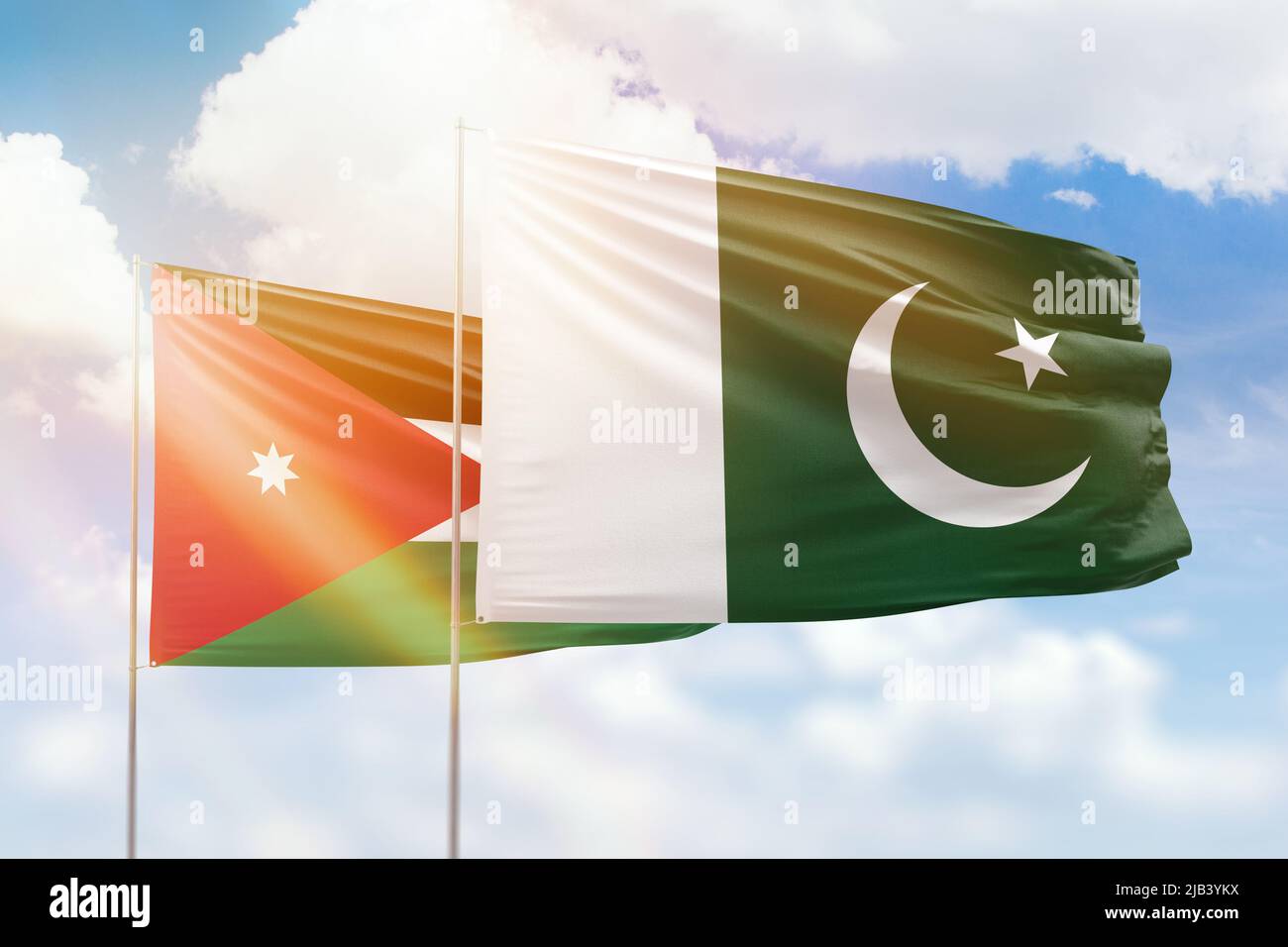 Sunny blue sky and flags of pakistan and jordan Stock Photo - Alamy