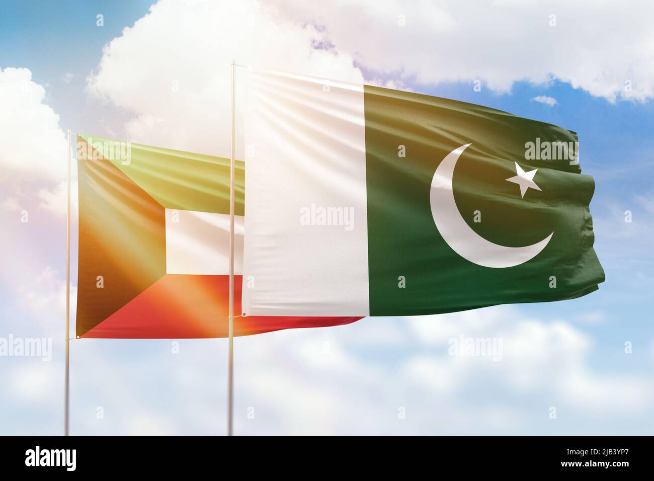 Sunny blue sky and flags of pakistan and kuwait Stock Photo - Alamy