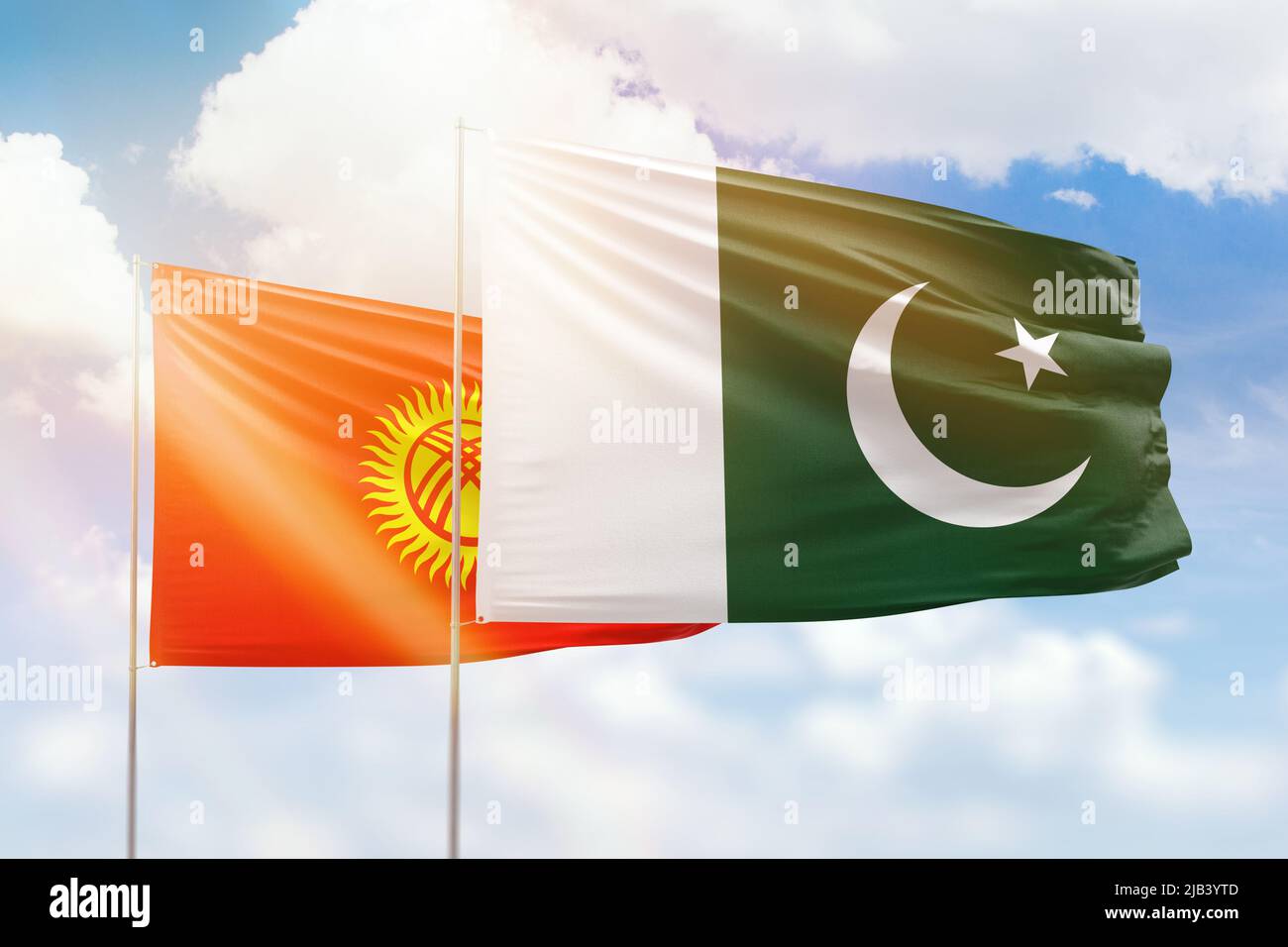 Sunny blue sky and flags of pakistan and kyrgyzstan Stock Photo - Alamy