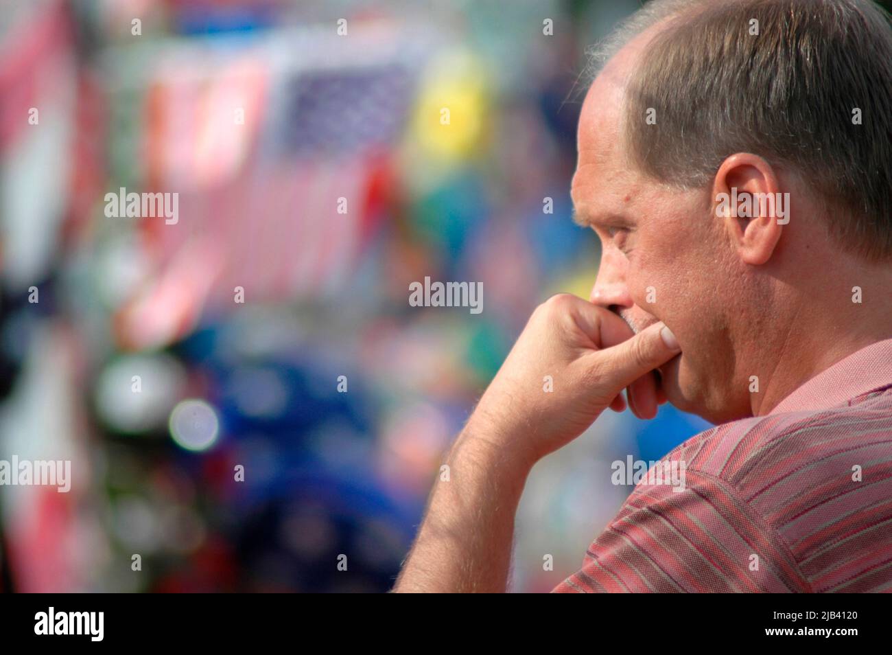 pensive People at memorial for dead soldiers sad and looking at the ...