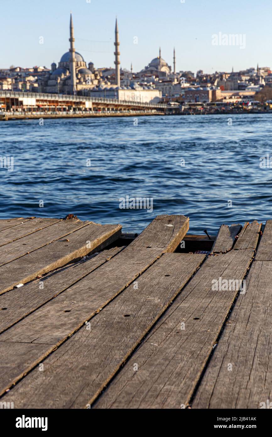 Wooden pier in old Istanbul. Boards with a background of the Bosphorus ...
