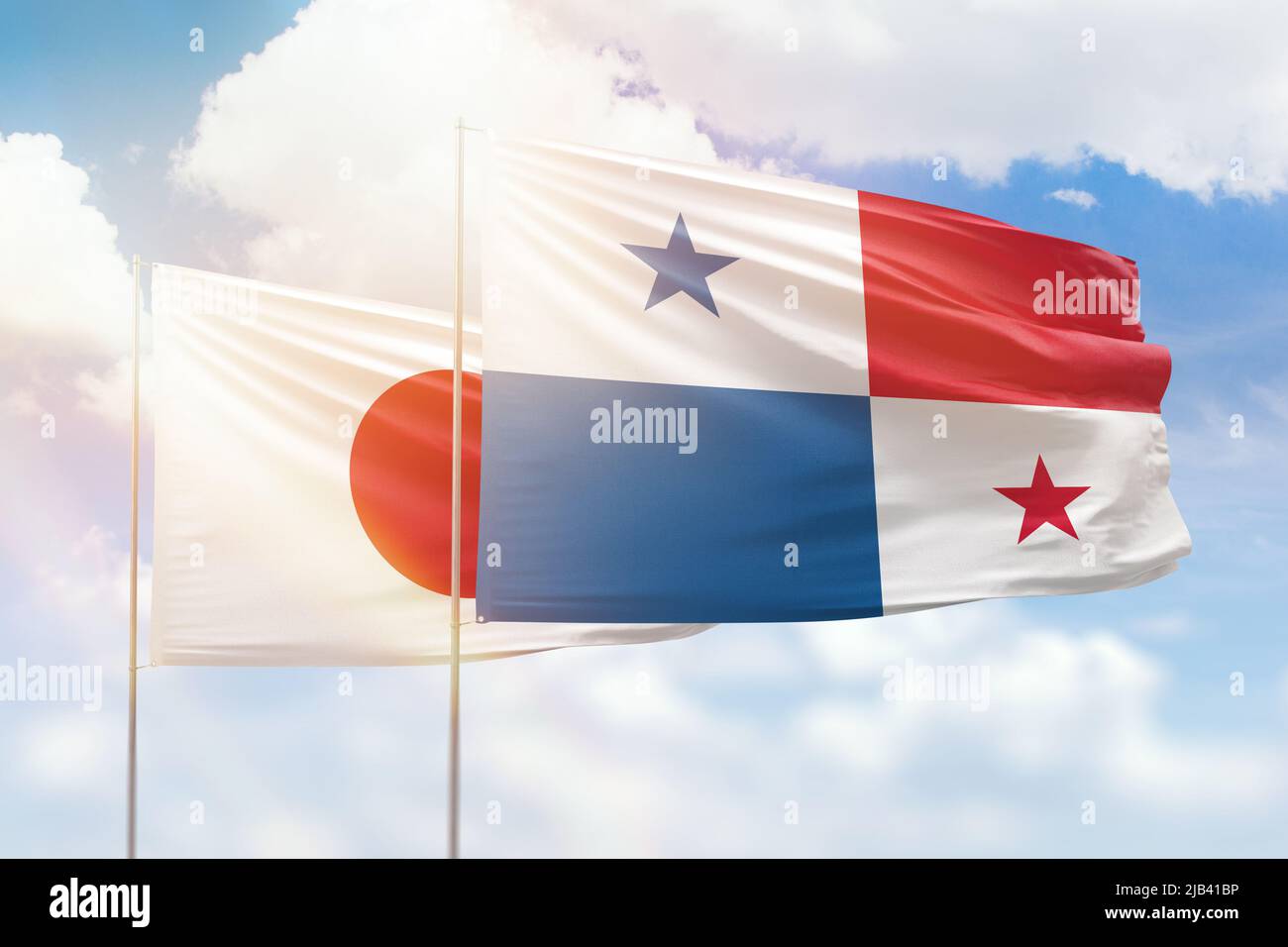 Sunny blue sky and flags of panama and japan Stock Photo - Alamy