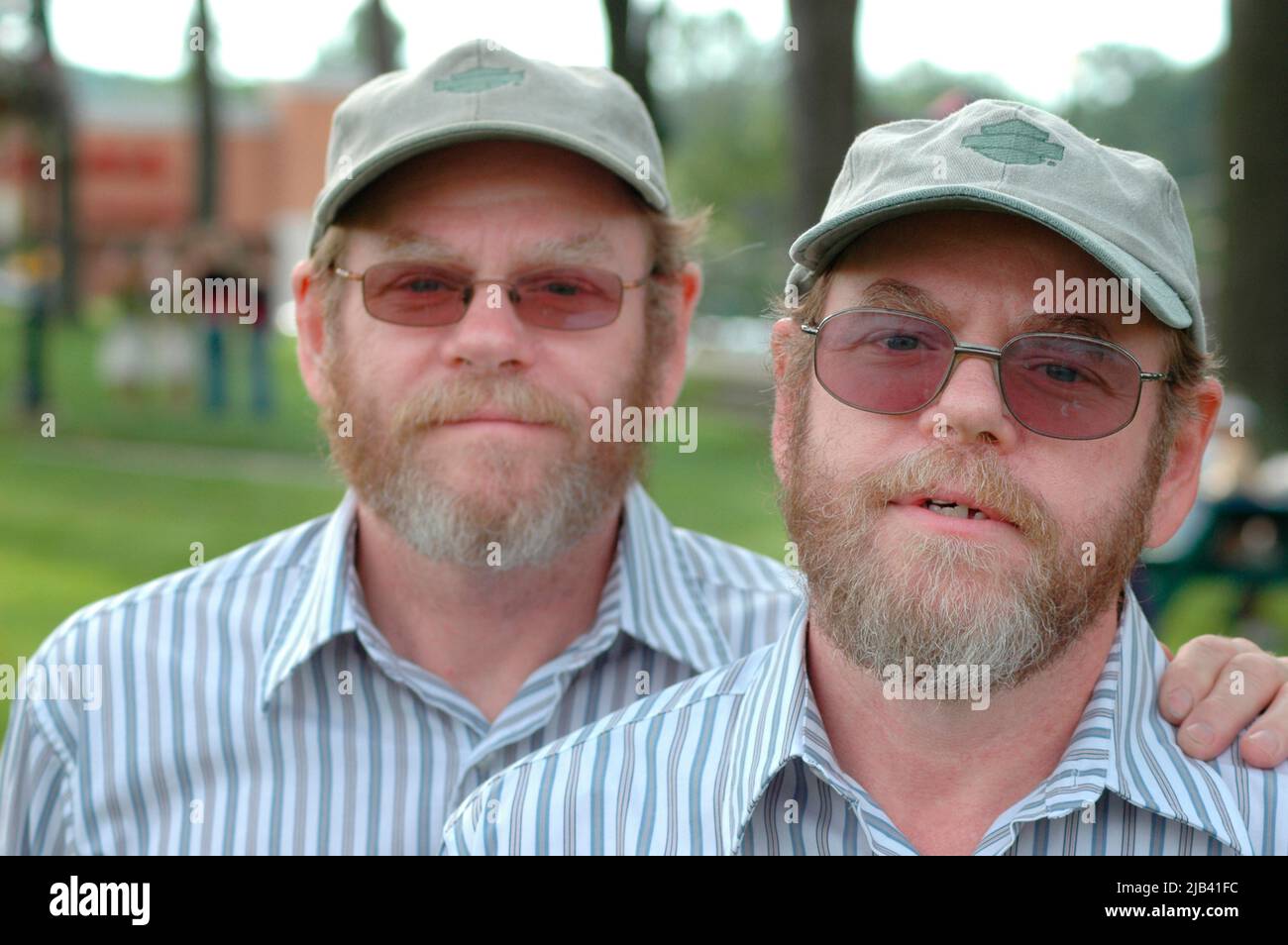 Three identical brothers hi-res stock photography and images - Alamy