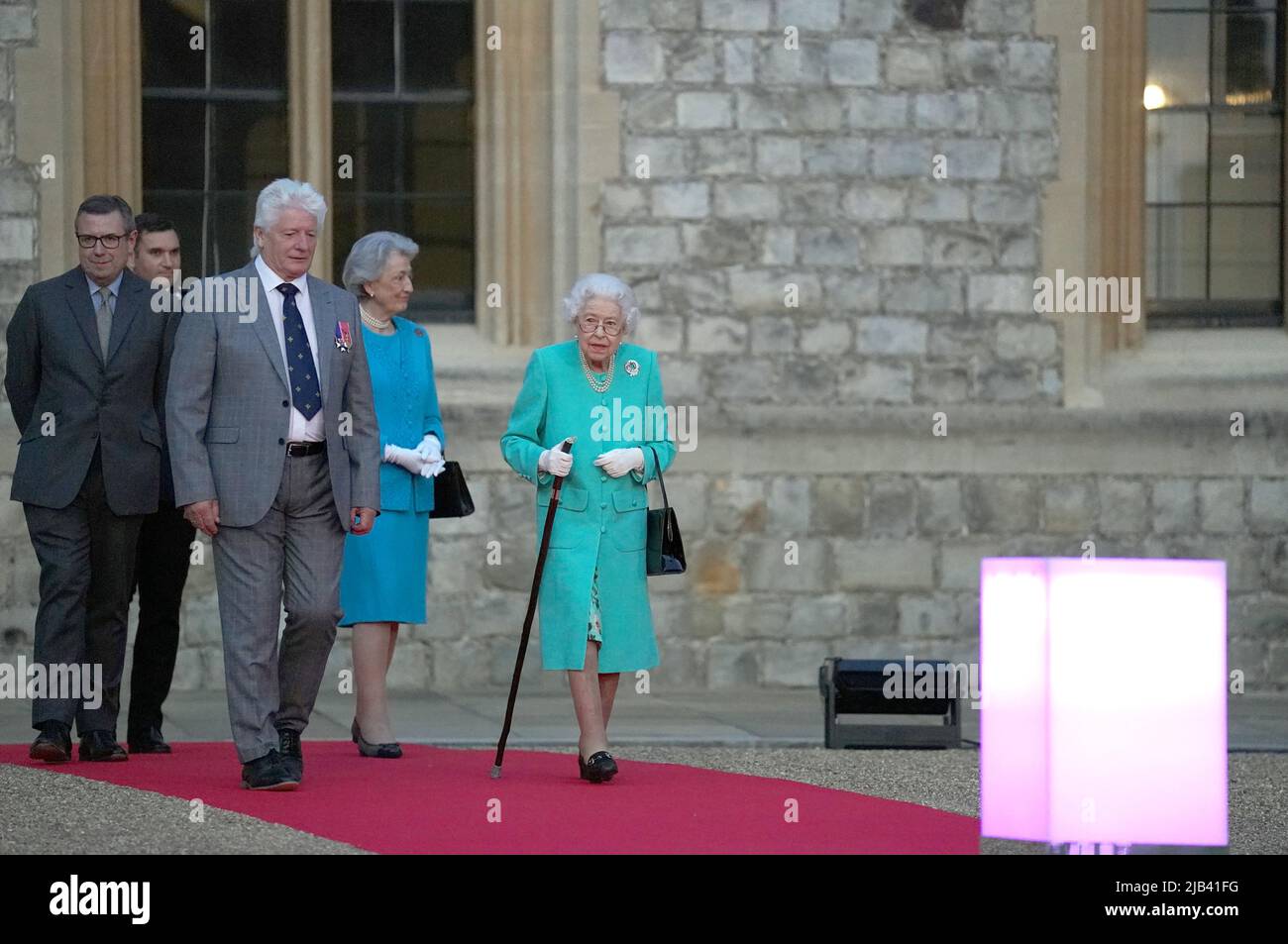 Queen Elizabeth II arrives to symbolically lead the lighting of the ...