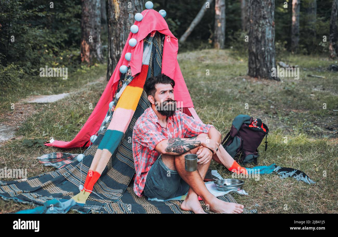 Camping tent on sunny day. Camping outdoor back to nature. Summer camp ...