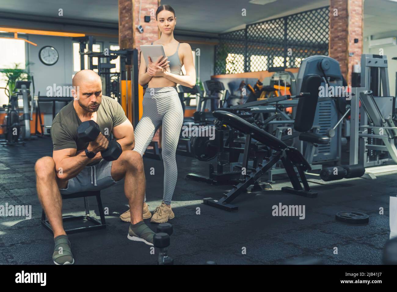 Woman Sitting On Man Bench Press