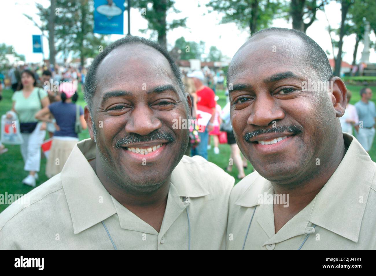 Black twin brothers looking alike Stock Photo - Alamy