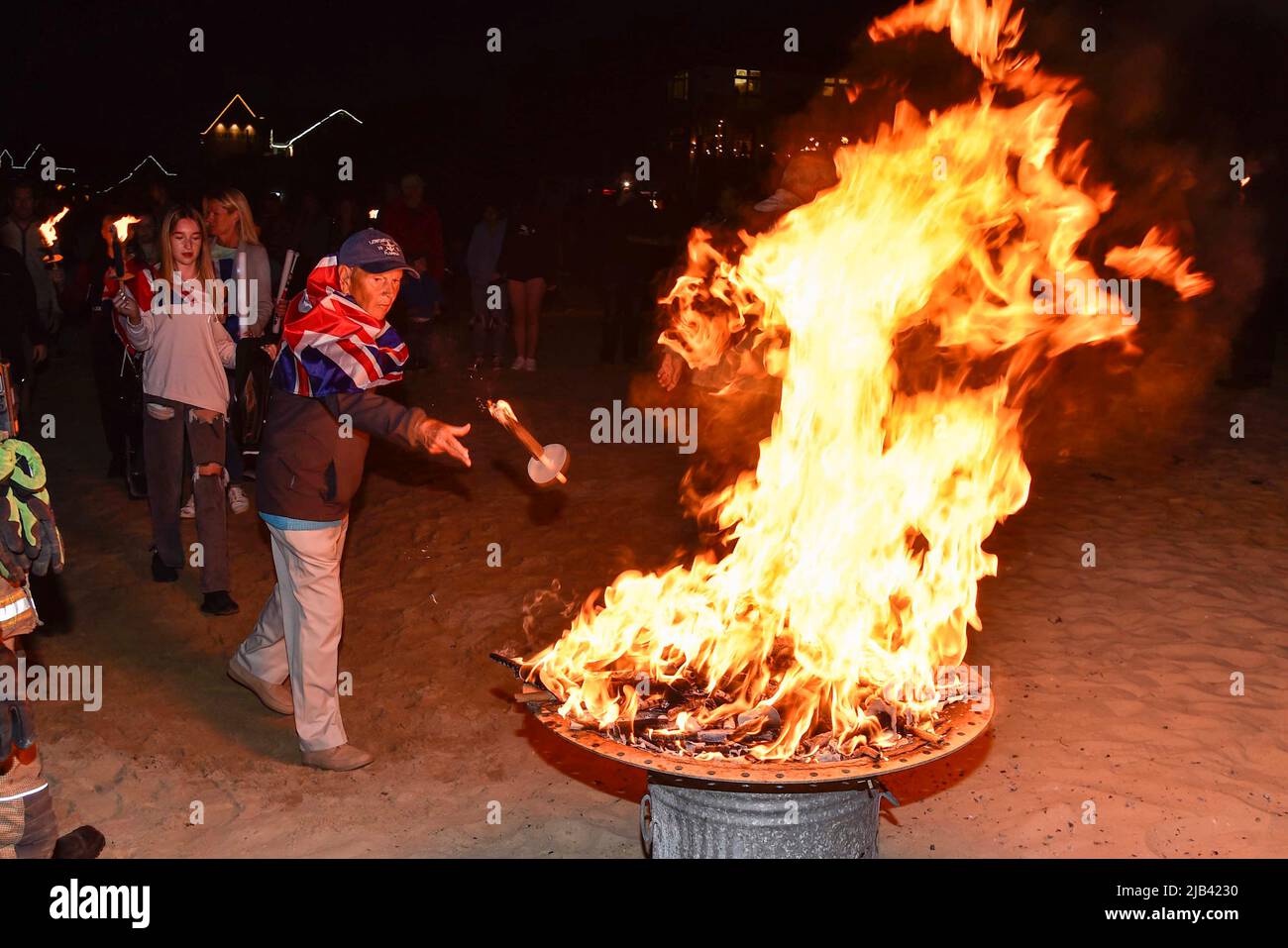 Lyme Regis, Dorset, UK. 2nd June 2022. Torchlight parade and beacon ...
