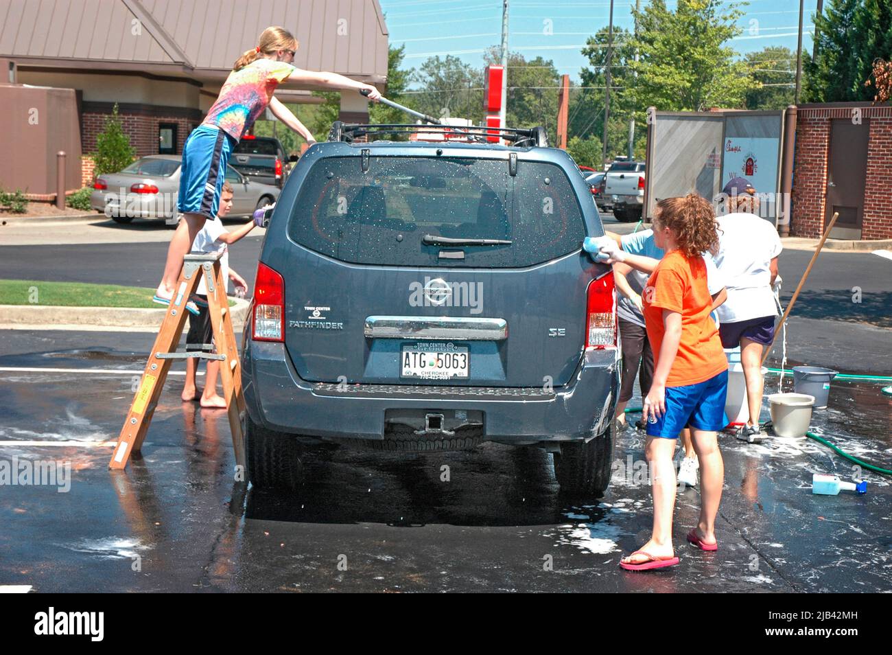Teen Atlanta Christian church group has a donation car wash to help ...