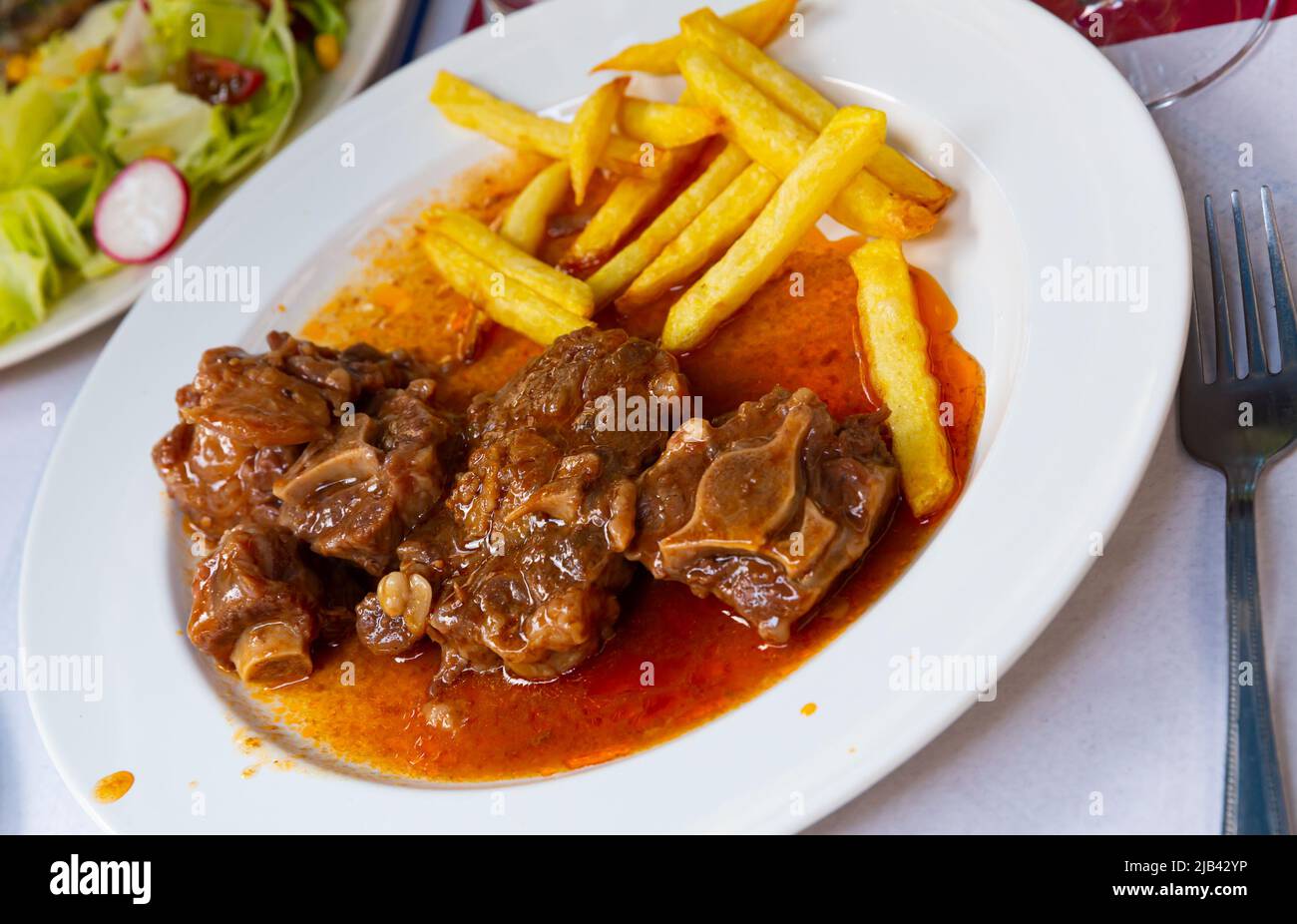 Meat for bull tail stew Rabo de toro Spain Stock Photo - Alamy