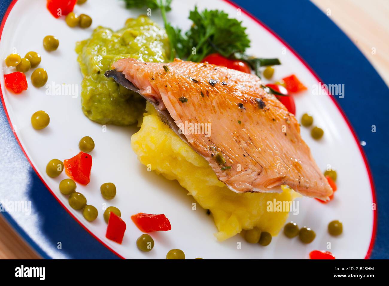 Grilled fillet of trout with potato mash and guacamole Stock Photo - Alamy