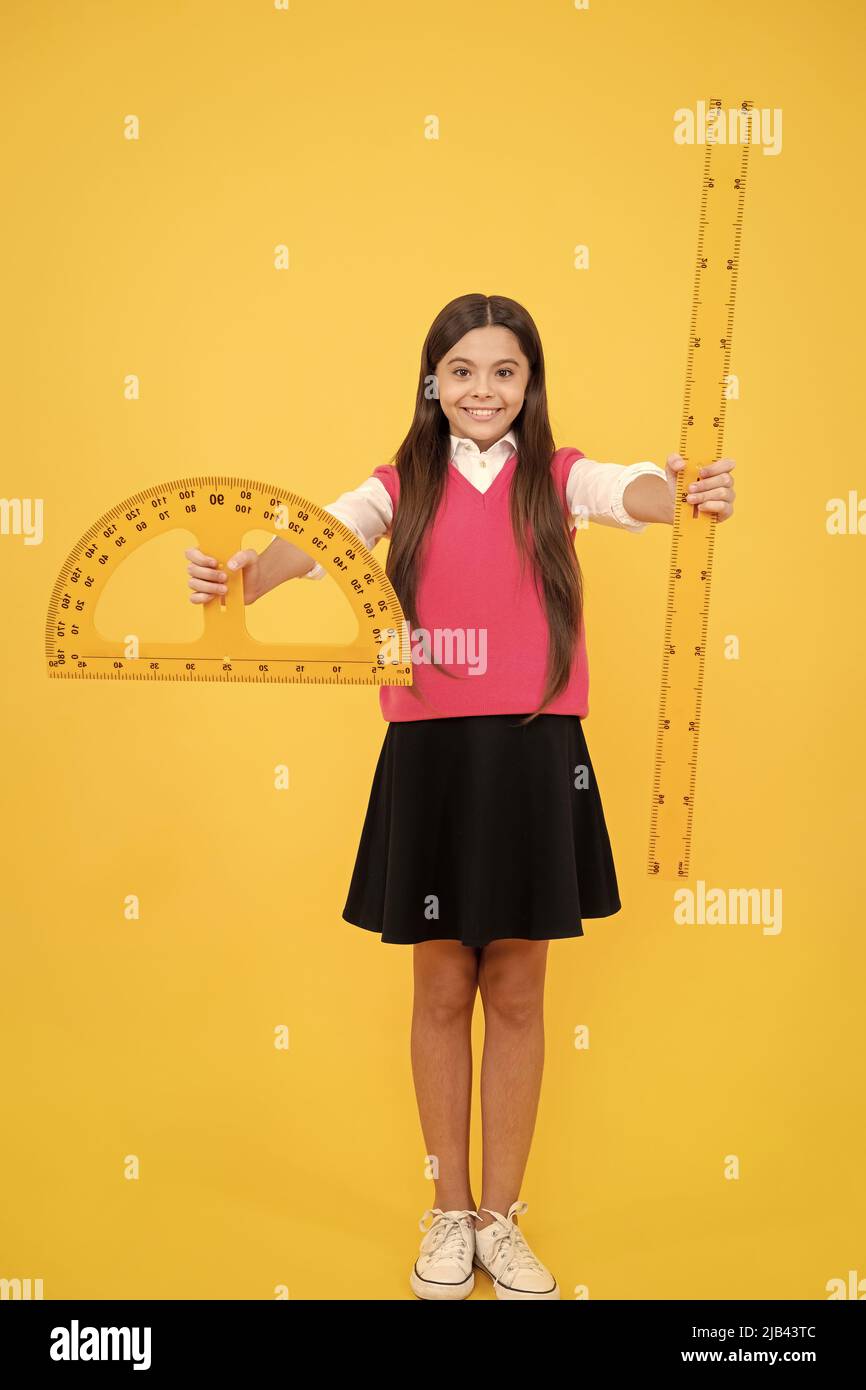 happy kid girl use protractor ruler to learn mathematics, measurement ...