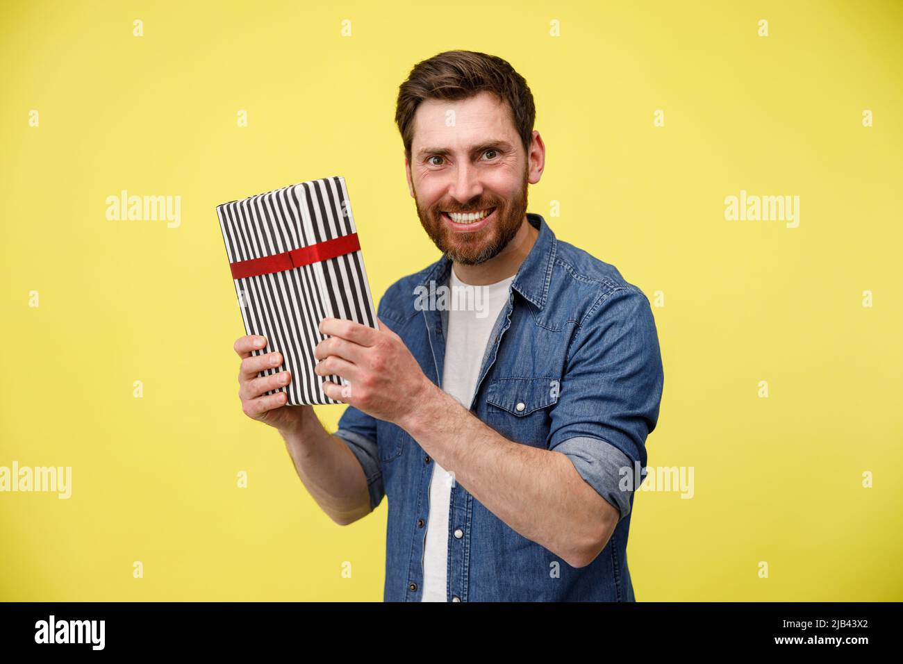 Happy man looking great gift hi-res stock photography and images - Alamy