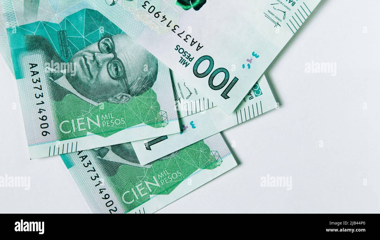 colombian money, one hundred thousand pesos on white background Stock ...