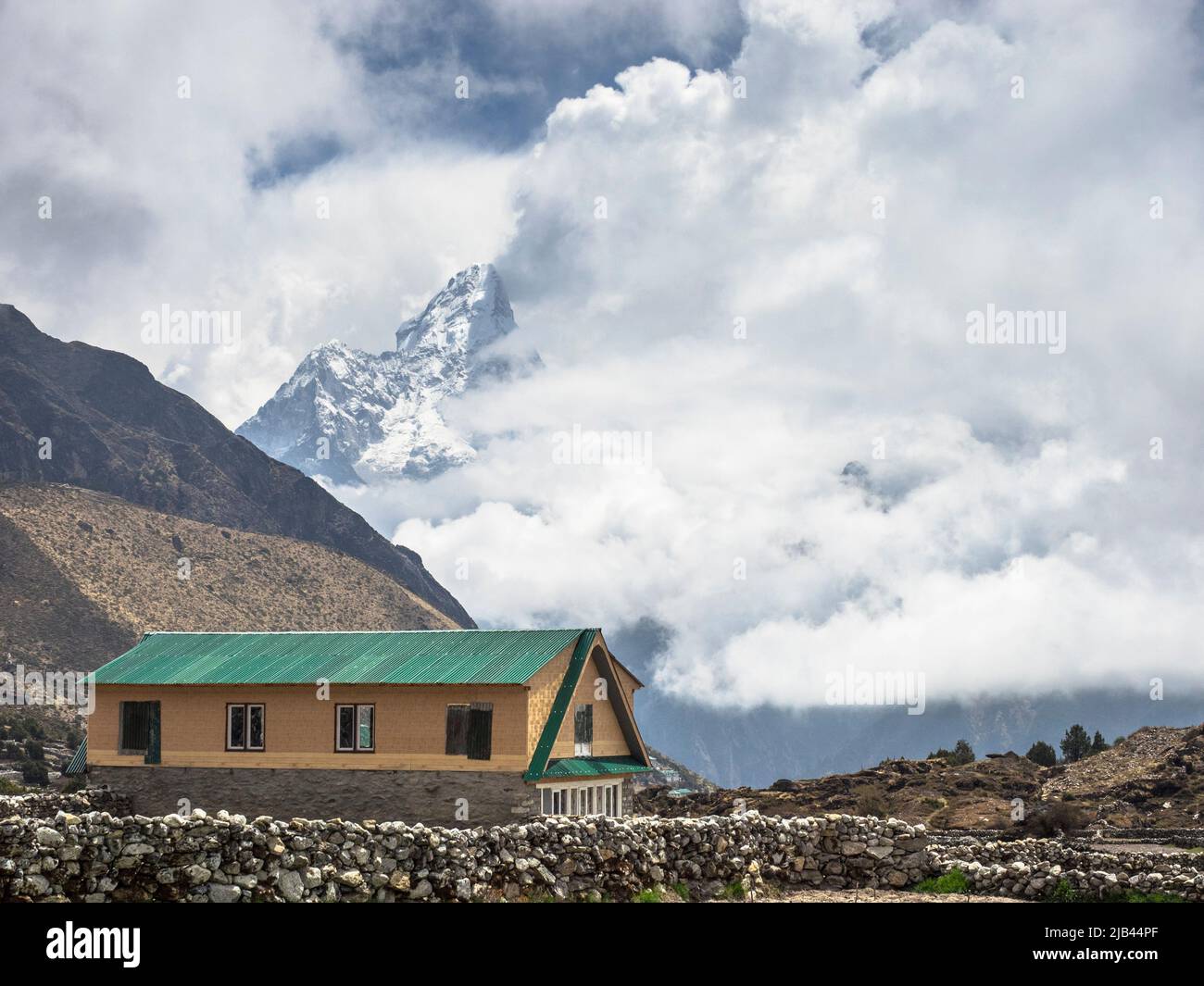 Hiding behind fence hi-res stock photography and images - Alamy