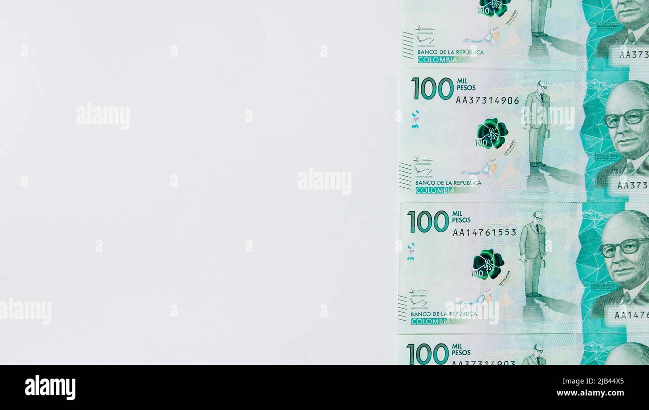 colombian money, one hundred thousand pesos on white background Stock ...