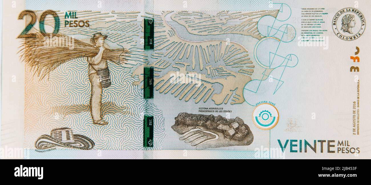 colombian money, twenty thousand pesos on white background Stock Photo ...
