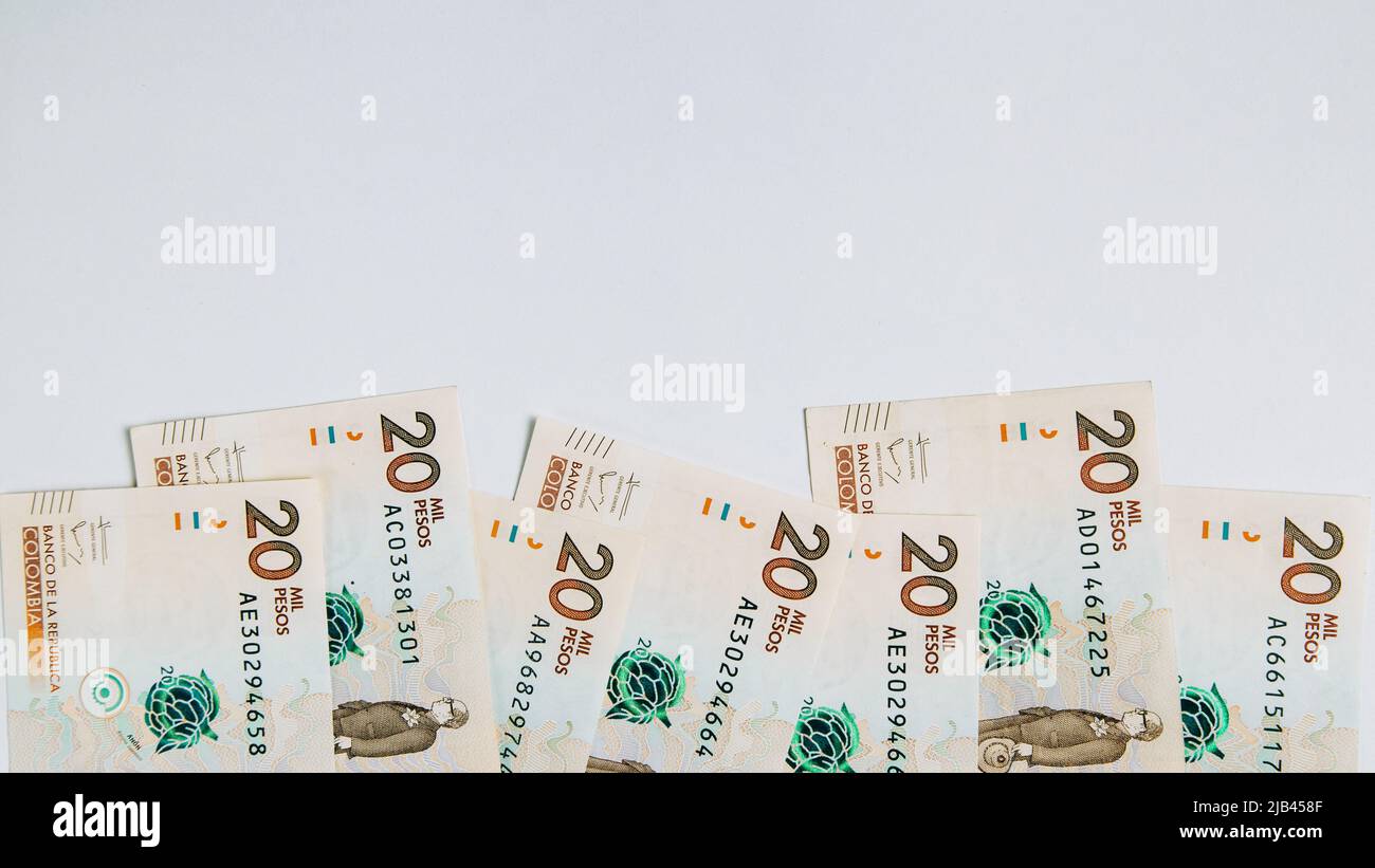 colombian money, twenty thousand pesos on white background Stock Photo ...