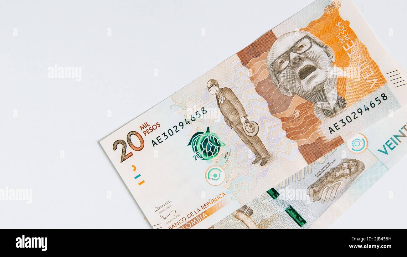colombian money, twenty thousand pesos on white background Stock Photo ...