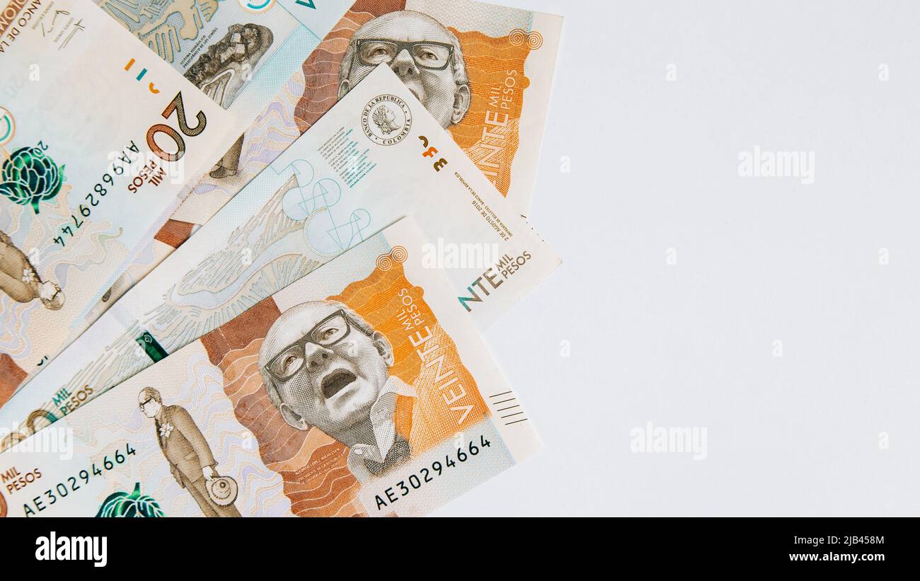 colombian money, twenty thousand pesos on white background Stock Photo ...