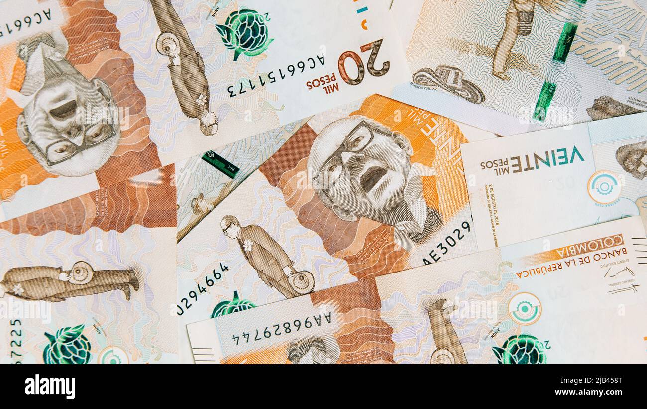 colombian money, twenty thousand pesos on white background Stock Photo ...