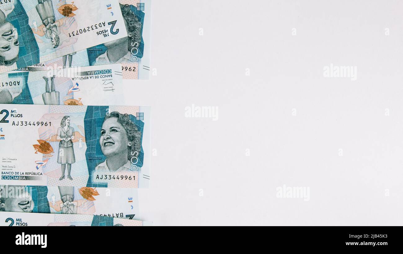 colombian money, two thousand pesos on white background Stock Photo - Alamy