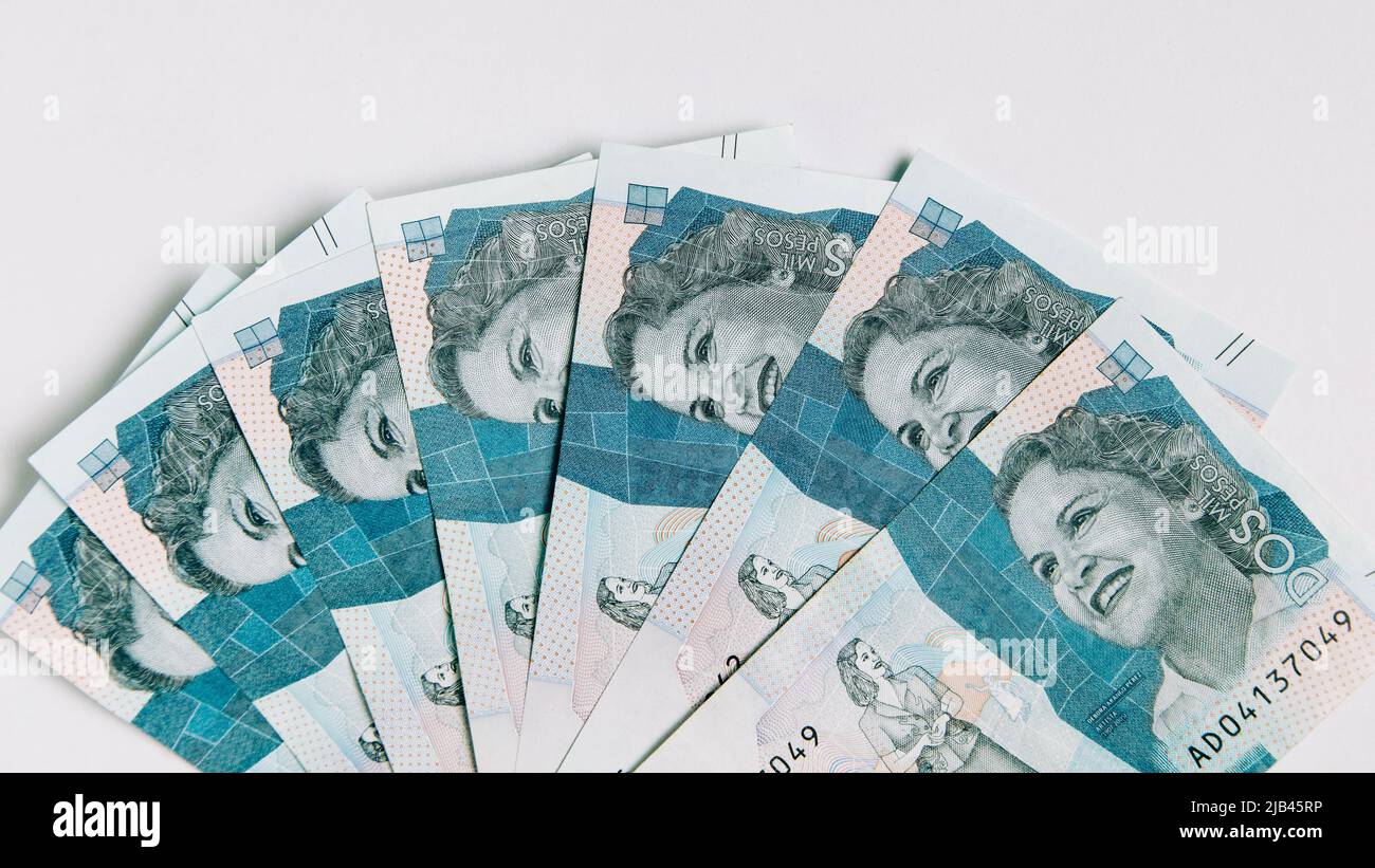 colombian money, two thousand pesos on white background Stock Photo - Alamy