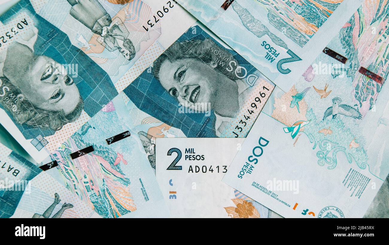 colombian money, two thousand pesos on white background Stock Photo - Alamy