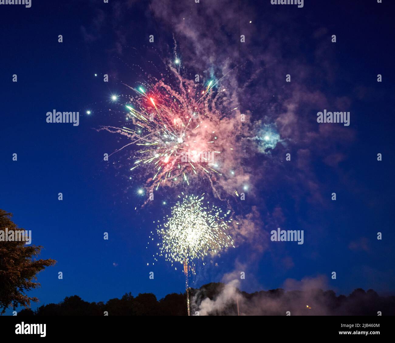 Bickington, Devon, UK. 2nd June 2022. Fireworks light the night sky as ...