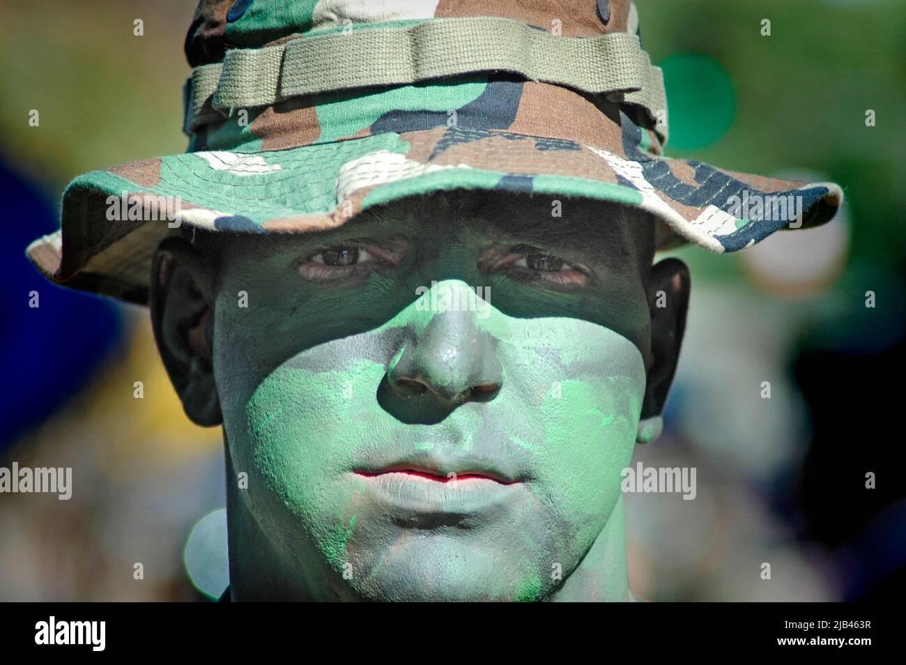 Young soldiers in camouflaged Army face paint in formation about to go ...
