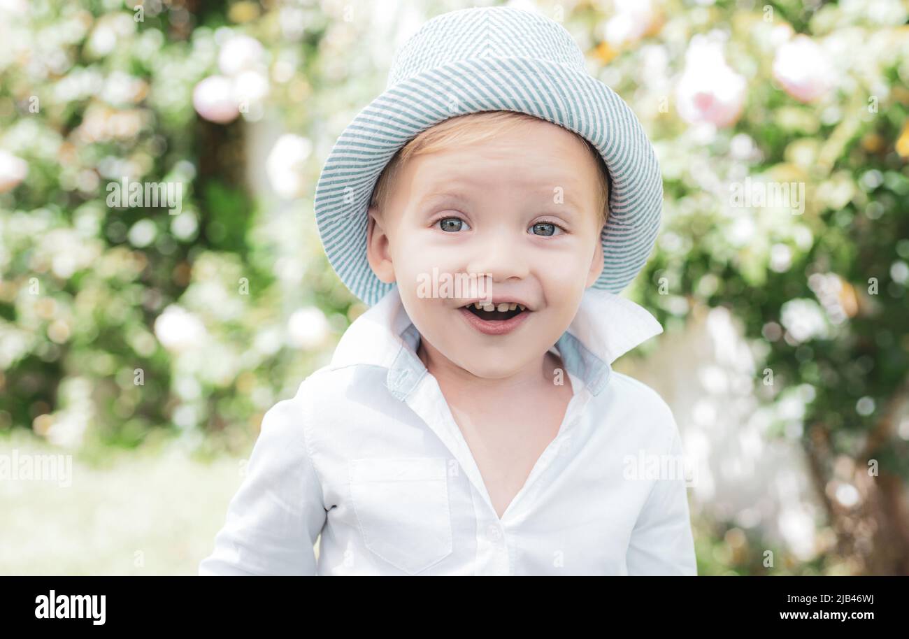 Fun, funny child face. Beautiful fun day for cute little boy in nature ...