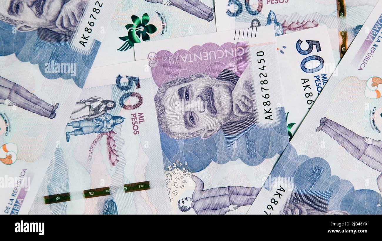 colombian money, fifty thousand pesos on white background Stock Photo ...