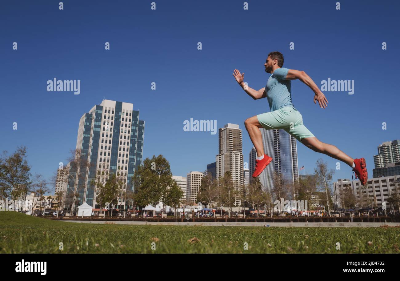 Sportsman running in middle street hi-res stock photography and images ...