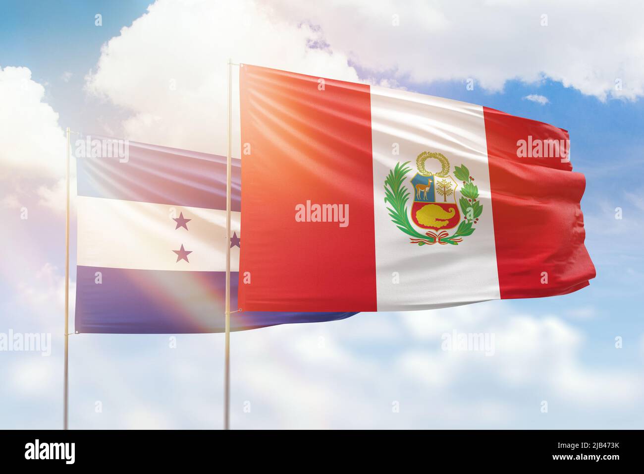 Sunny blue sky and flags of peru and honduras Stock Photo - Alamy