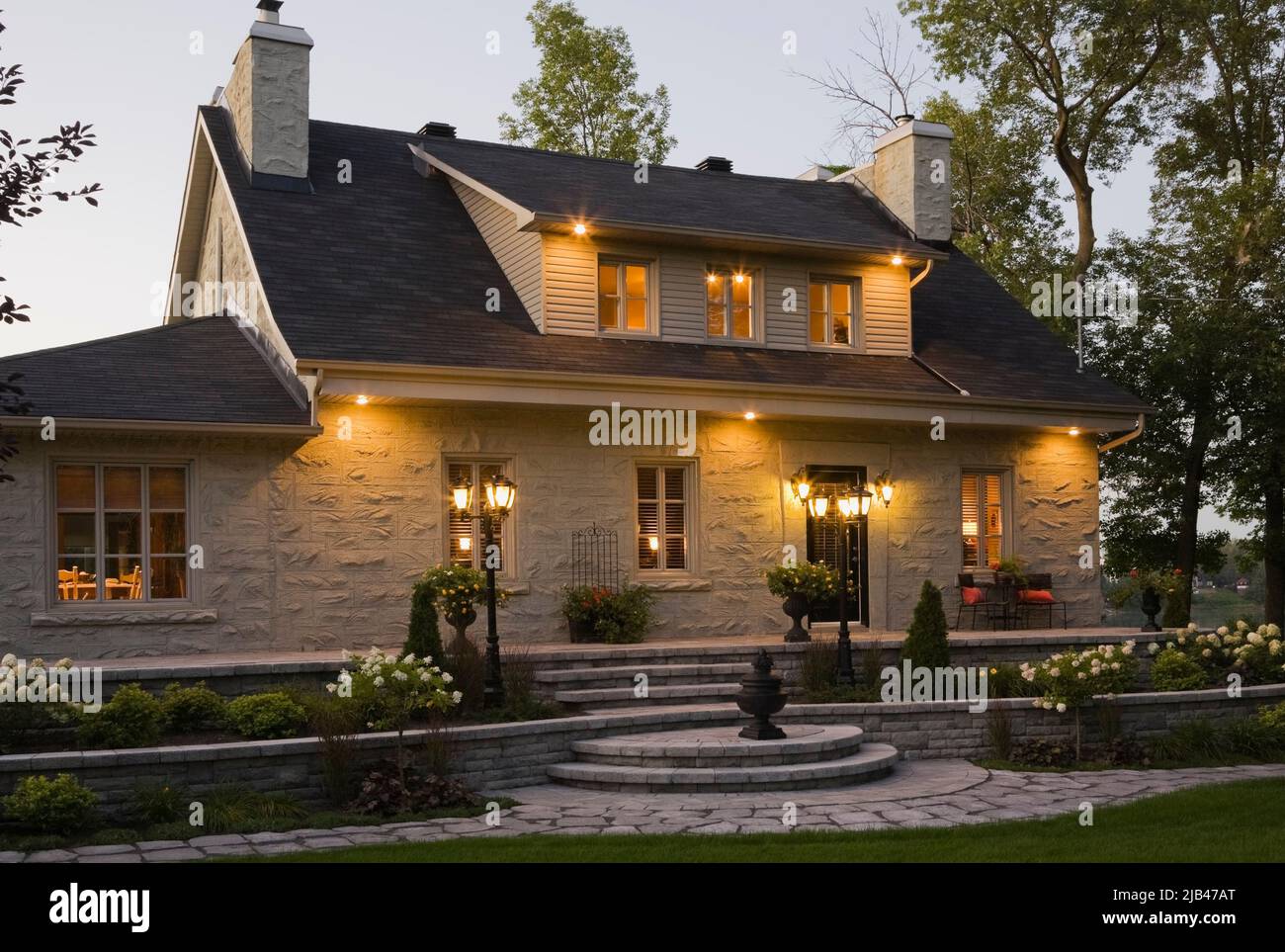 Old circa 1840 Canadiana style home with coat of grey cement applied ...